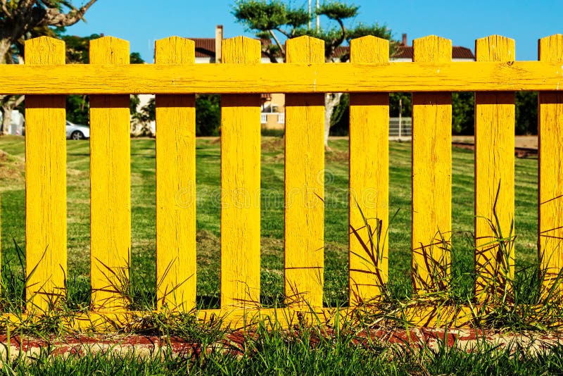Yellow wooden fence. stock image. Image of child, home - 82334199