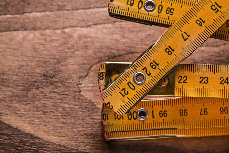 Yellow Wooden Meter on Wood Board Top View Construction Concept Stock ...