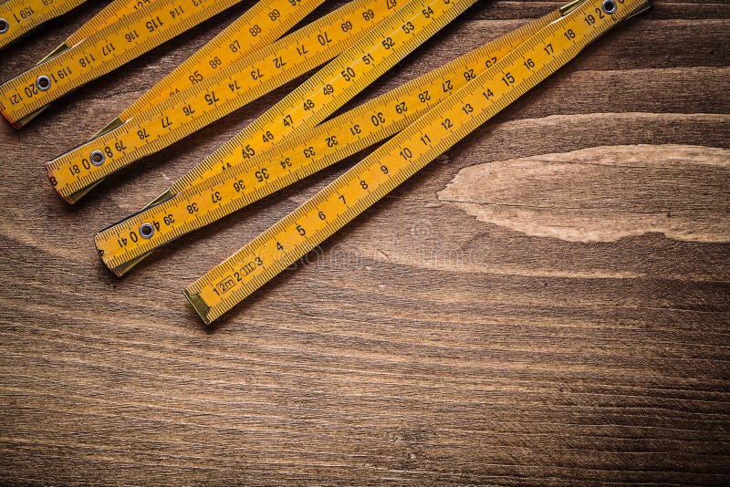 Yellow Wooden Meter on Wood Board Top View Construction Concept Stock ...