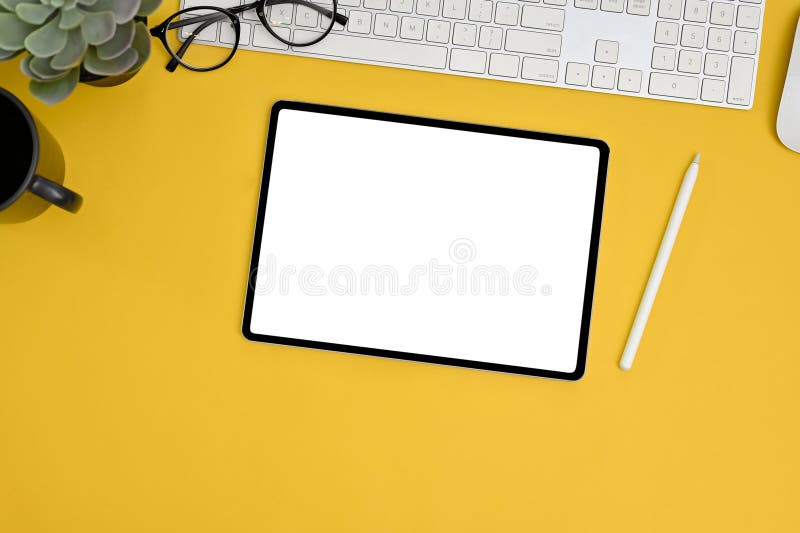 Yellow Workspace Tabletop with Accessories and Tablet White Screen ...