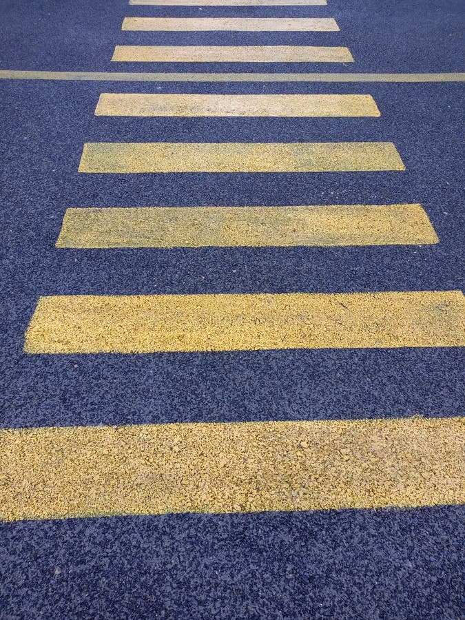 Yellow Zebra Cross stock image. Image of asphalt, tile - 229876007