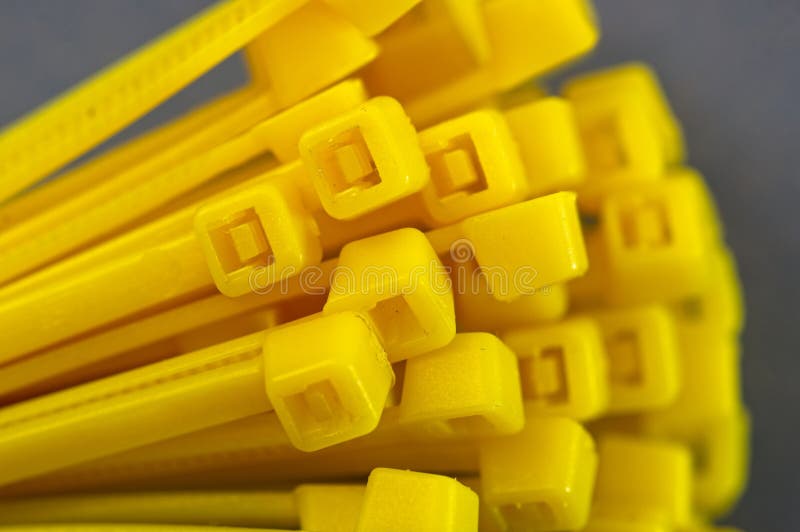 Yellow Zip Ties in a Bundle Stock Image - Image of tidy, plastic: 329635885
