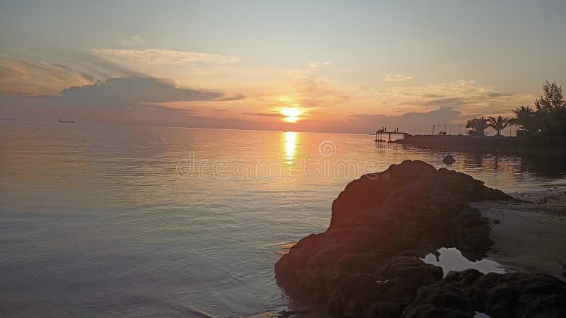 Yellowish Sunset at Mirota Beach Batam Island Stock Image - Image of ...