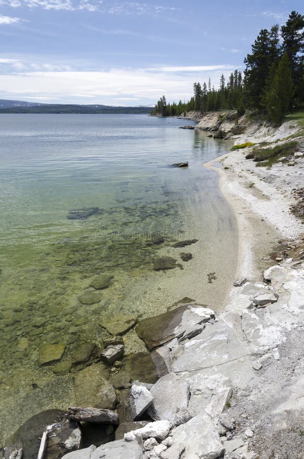 Yellowstone lake stock photo. Image of rocks, lake, park - 25833450