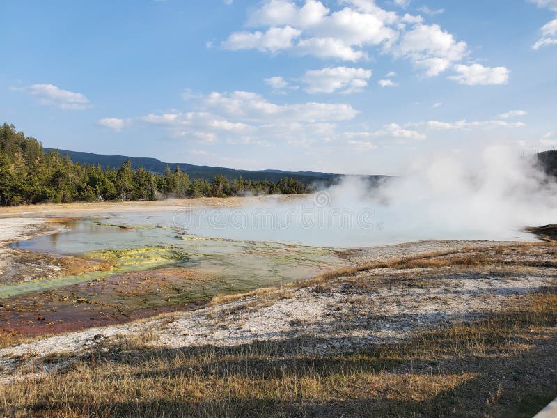 Yellowstone steaming lake stock image. Image of cloud - 213847409