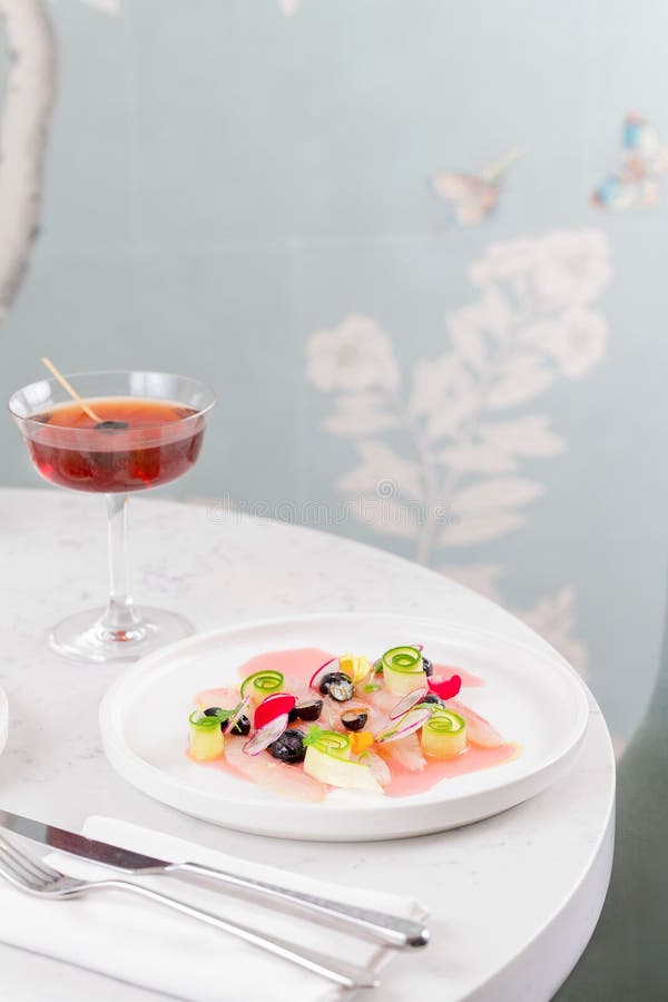 Yellowtail Crudo Plate stock photo. Image of delicious - 277340124