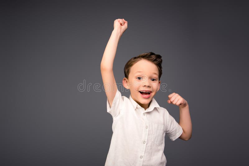 Yes! Happy Little Boy Triumphing with Raised Hands Stock Image - Image ...