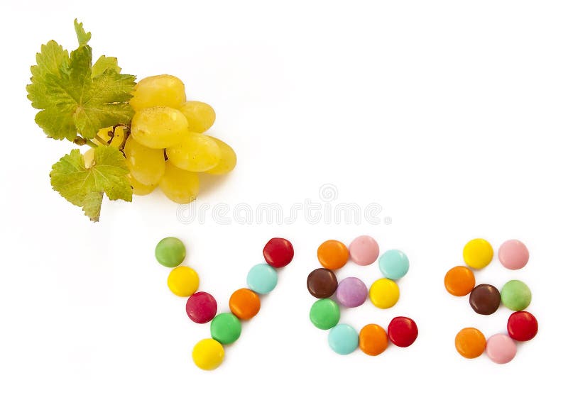 YES Inscription of Candy and Fresh Grapes Stock Image - Image of leaf ...