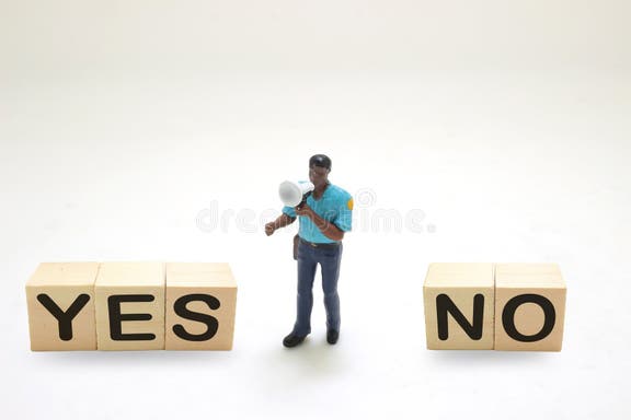 YES and NO Text Alphabet White Cube. Miniature People Stock Photo ...
