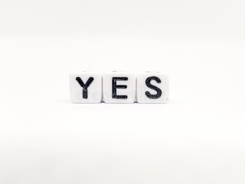 Yes Word Built with White Cubes and Black Letters on White Background ...