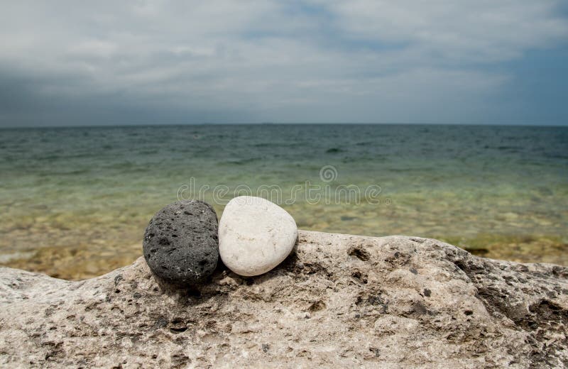 Yin Yang Stones on the Beach Stock Image - Image of eternity, love ...