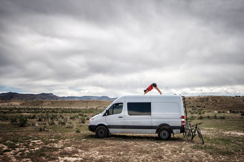 Yoga on an adventure van stock photo. Image of mountain - 55080888
