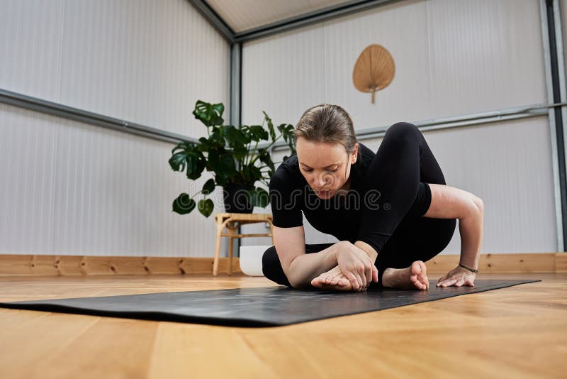 Yoga Asana in a Yoga Studio with Natural Light. Yoga Instructors with ...