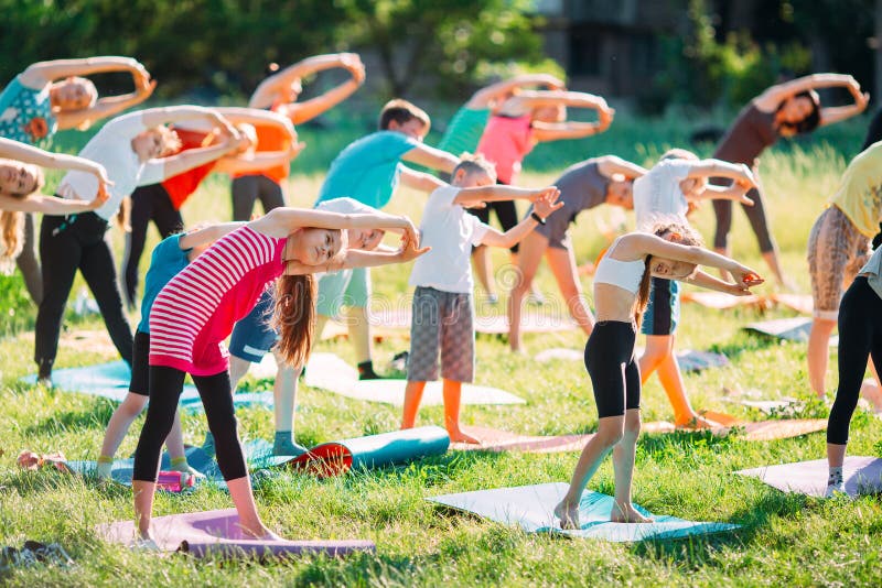 Yoga Classes Outside on the Open Air. Kids Yoga, Stock Image - Image of ...