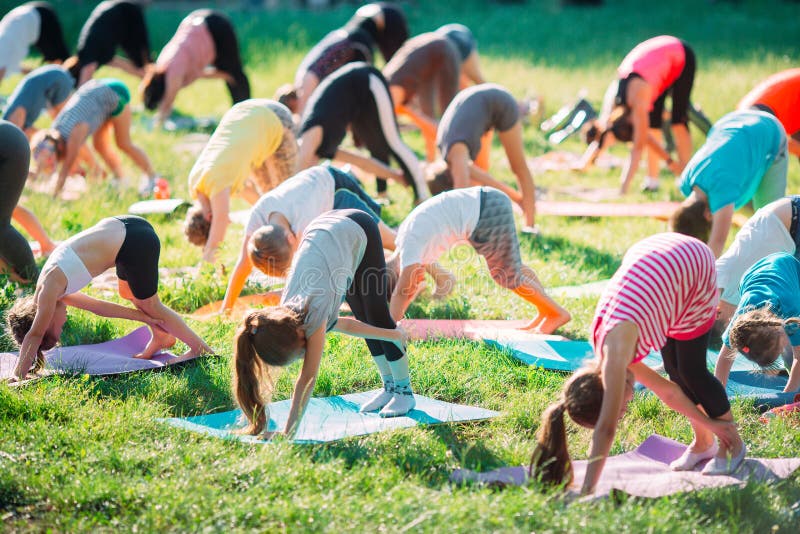 Yoga Classes Outside on the Open Air. Kids Yoga, Stock Photo - Image of ...
