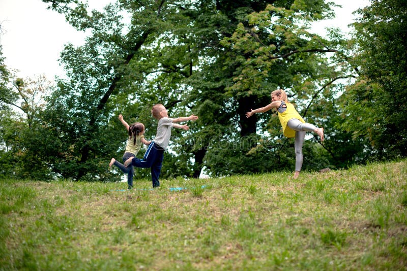 Teaching Posture and Balance Stock Photo - Image of happiness, family ...