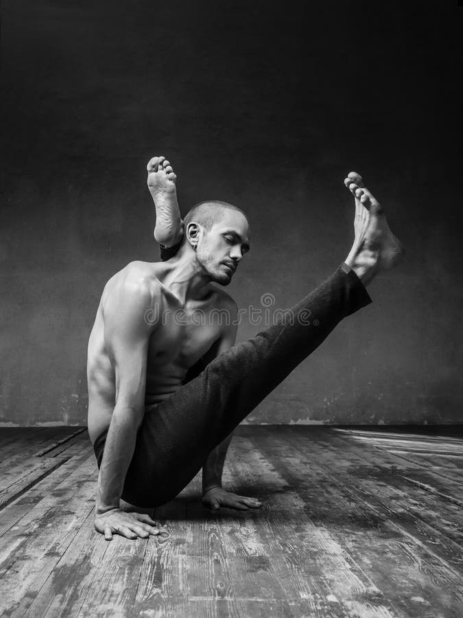 Yoga man posing in studio stock image. Image of mediation - 74677689