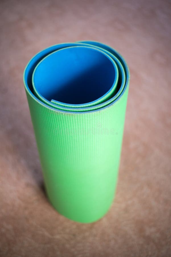 Yoga Mat Green and Blue Rolled Up Stock Photo - Image of ...