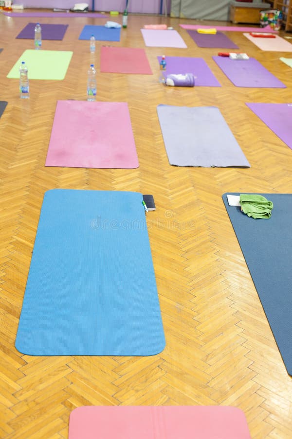 Colorful yoga mats stock photo. Image of education, indoor - 50747622