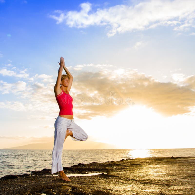 Yoga by the Ocean stock image. Image of practicing, fitness - 29053005
