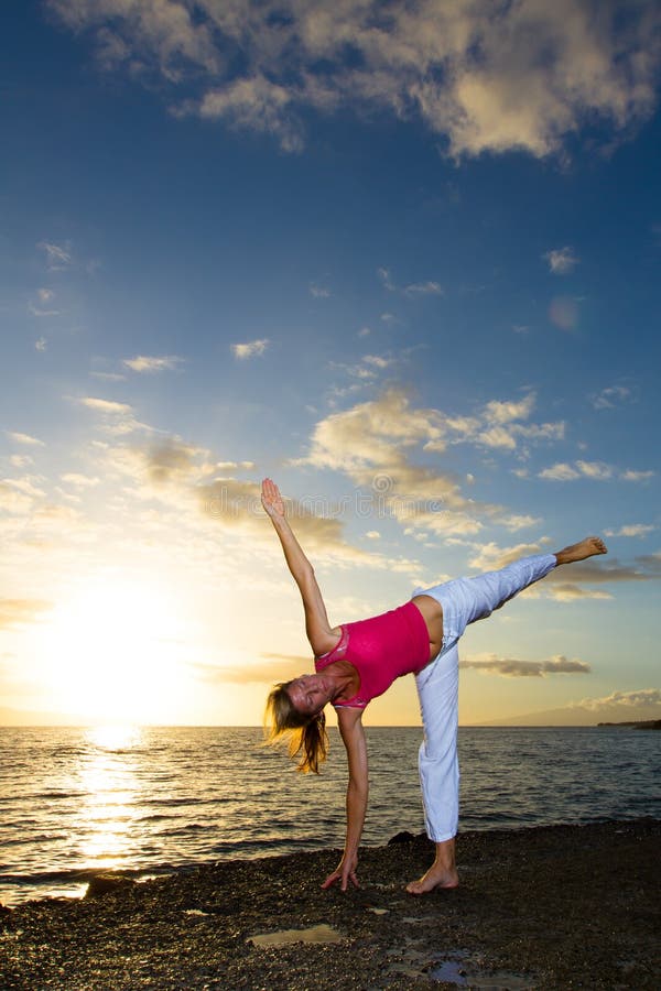 Yoga by the Ocean stock image. Image of flexible, female - 29052995