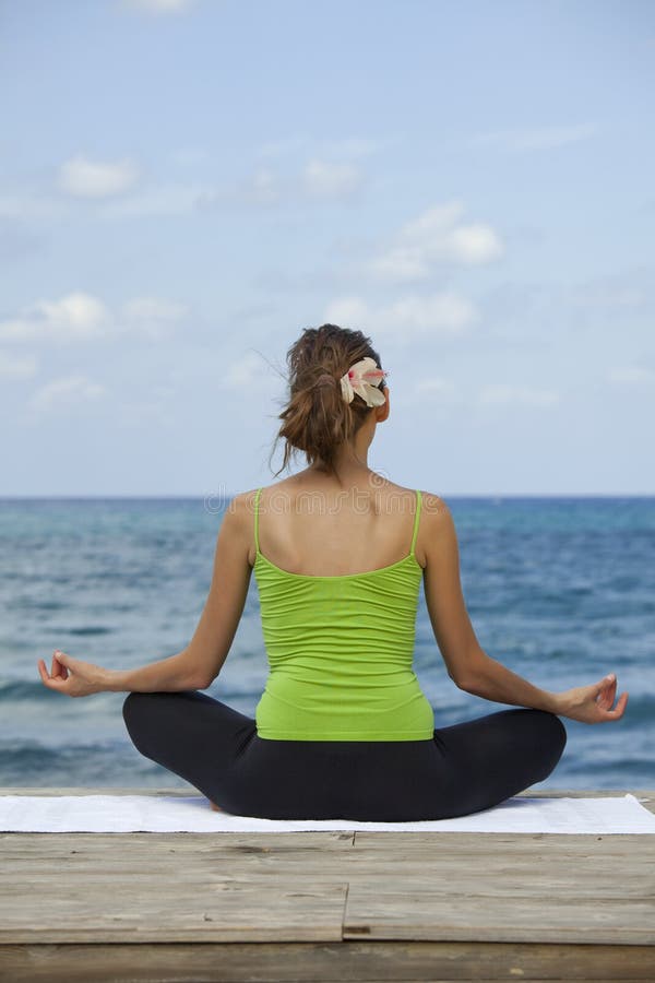 Yoga pose on the beach stock photo. Image of back, ocean - 11106010