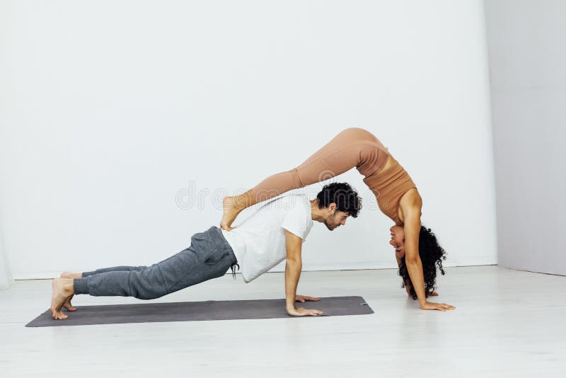 Yoga Poses Stretching Acrobats Workout in the Swing Room Stock Image ...