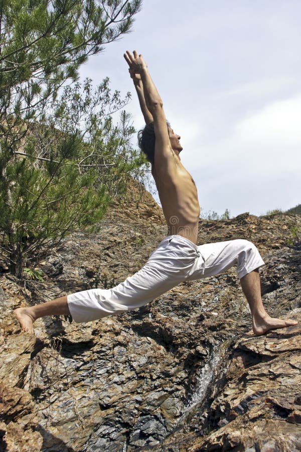 Yoga Posture on the rocks stock image. Image of calm, rock - 5130131