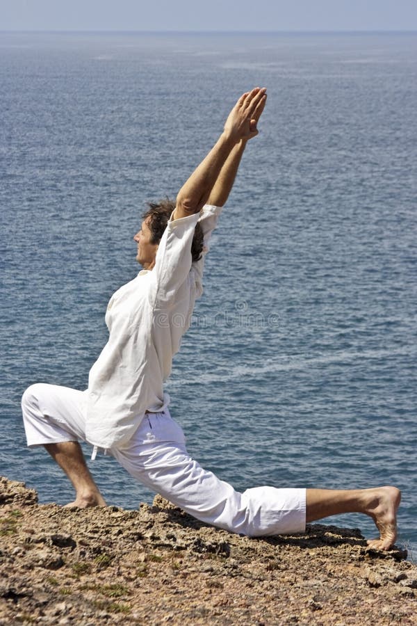Yoga posture on the rocks stock photo. Image of peace - 5005066