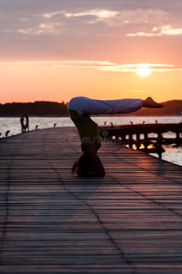 Yoga Practice during Sunset Stock Image - Image of beauty, lifestyle ...