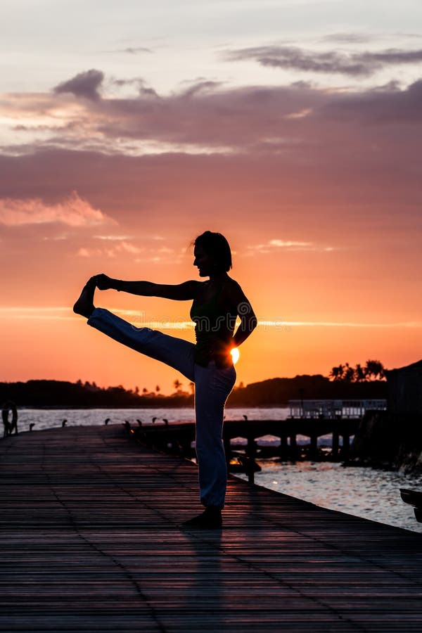 Yoga Practice during Sunset Stock Photo - Image of magical, body: 32753728