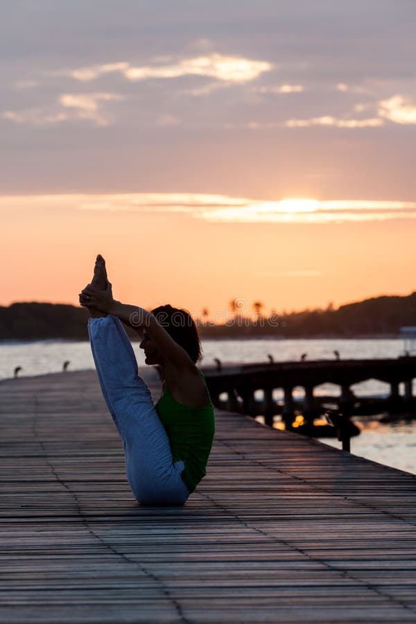 Yoga Practice during Sunset Stock Image - Image of enjoy, beauty: 32753585