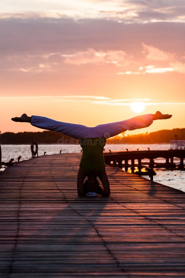 Yoga Practice during Sunset Stock Image - Image of beauty, lifestyle ...