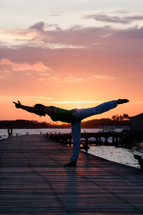 Yoga Practice during Sunset Stock Image - Image of beauty, lifestyle ...