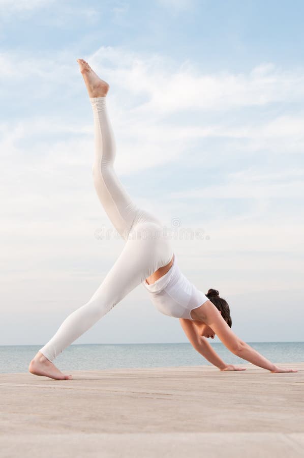 Yoga at sea stock photo. Image of peace, attractive, girl - 21389726