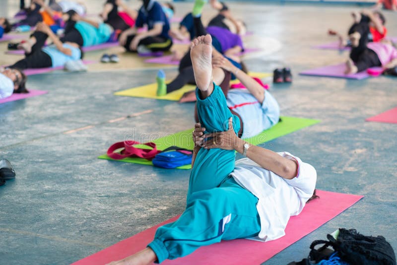 Yoga for senior exercising editorial photography. Image of park - 149418082