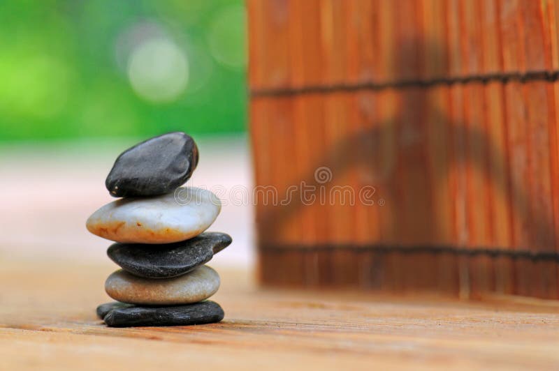 Yoga Shadow by Stacked Stones in Garden Stock Image - Image of outdoor ...