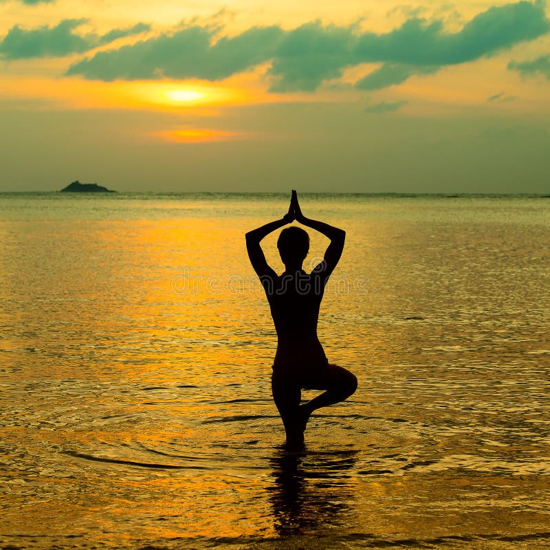 Yoga silhouette at sunset stock image. Image of people - 43931751
