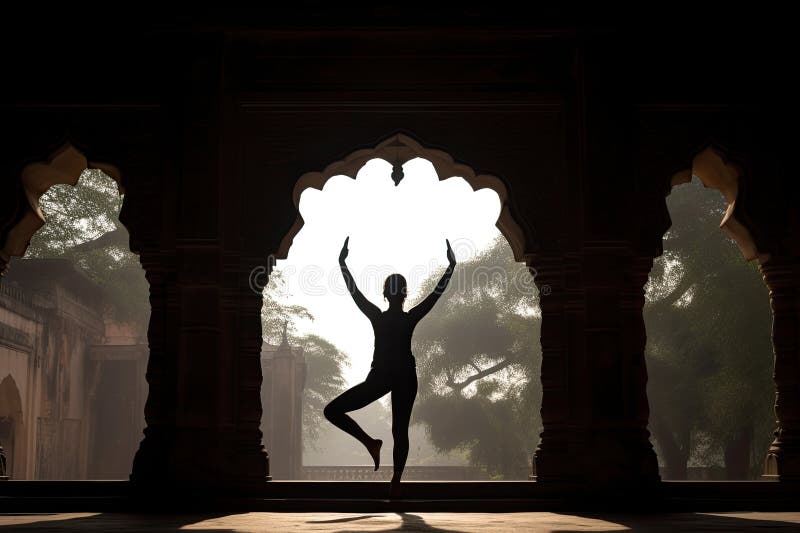 Yoga Silhouette in Temple Yoga Pose Meditates at Sunset with Temple ...