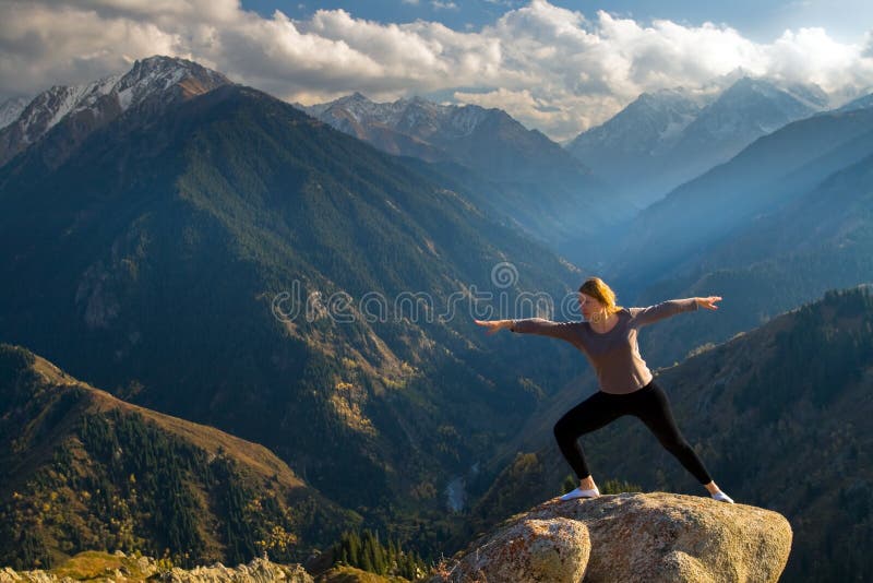 Yoga at summit stock image. Image of female, meditating - 26539977