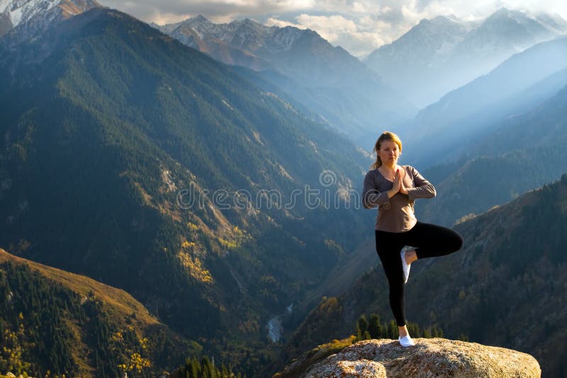 Yoga at summit stock image. Image of female, meditating - 26539977