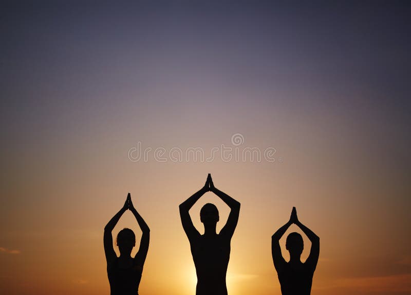 Yoga at sunset stock photo. Image of environment, group - 72685930