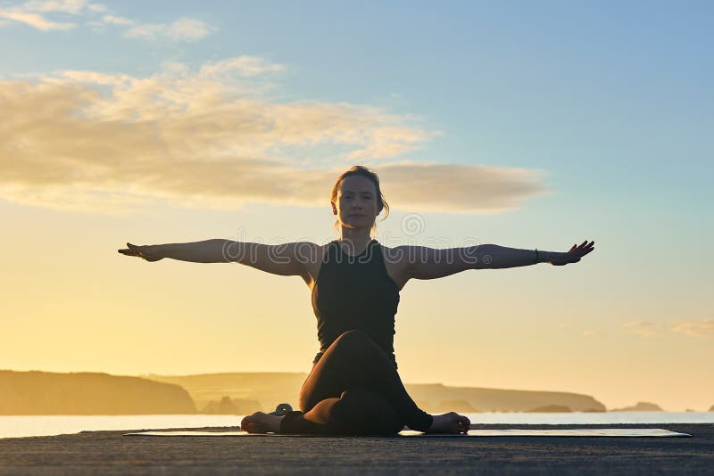 Yoga at Sunset Pose Looking at an Attractive Woman S Camera Stock Photo ...