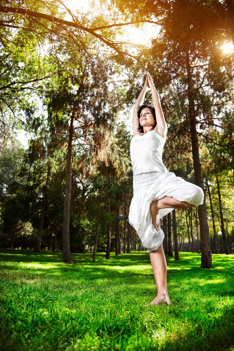 11,457 Yoga Tree Pose Stock Photos - Free & Royalty-Free Stock Photos ...