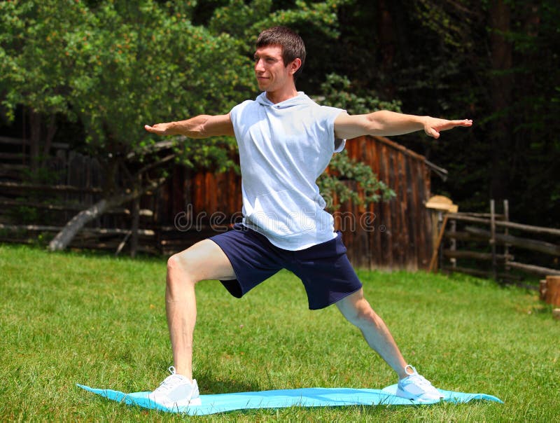 Yoga - Warrior Position stock image. Image of exercising - 26949995