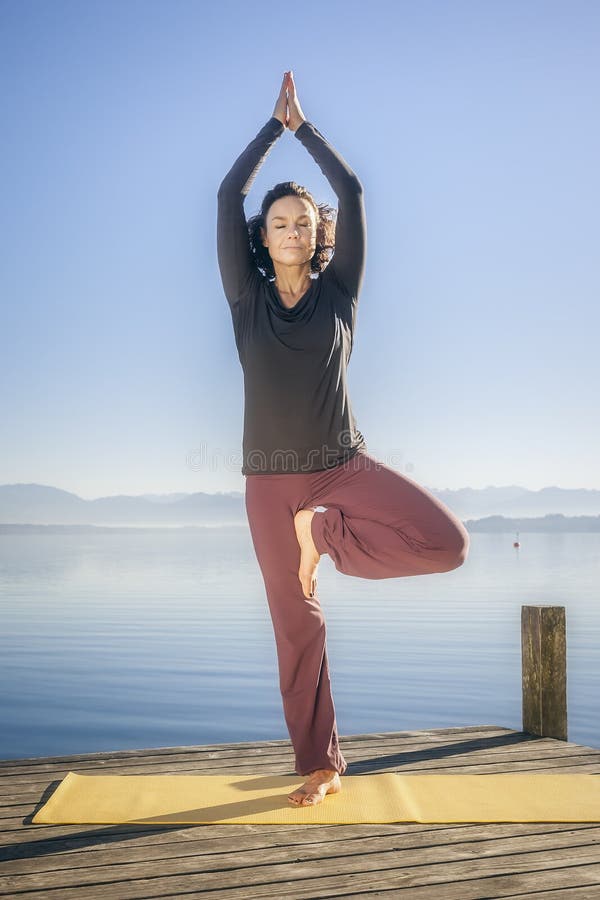 Woman doing yoga exercise stock photo. Image of energy - 6083210