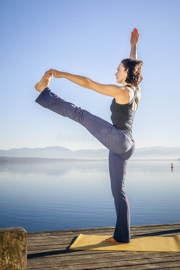 Young woman exercises yoga stock image. Image of body - 40164367