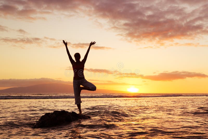 Yoga at Sunset on Beach. Woman Doing Yoga Stock Image - Image of ...