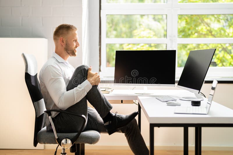 Yoga Workout in Office Behind Business Computer Stock Image - Image of ...