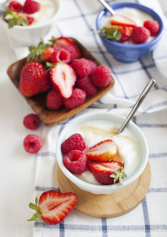 Yogurt with Berries and Honey in Small Bowl Stock Image - Image of ...